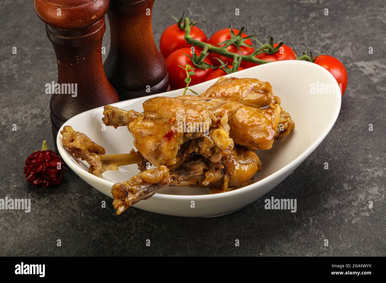Rabbit stew in sweet and spicy sauce Stock Photo - Alamy
