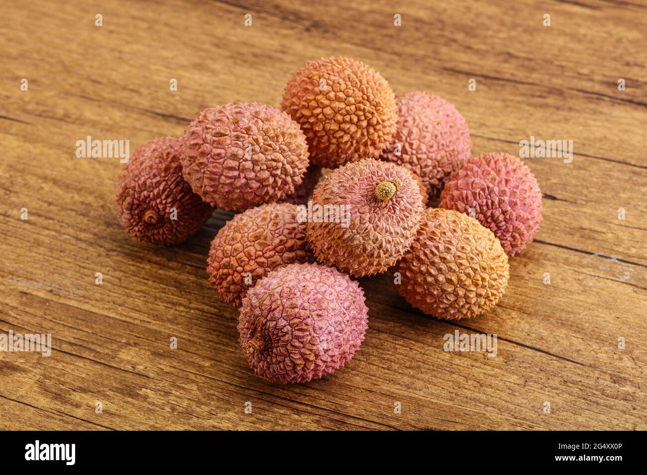 Tropical sweet exotic fruit lychee heap Stock Photo - Alamy