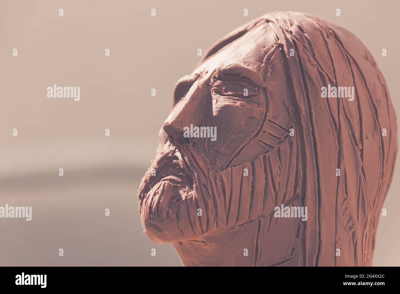 Photograph of Jesus Christ face clay sculpture Stock Photo - Alamy