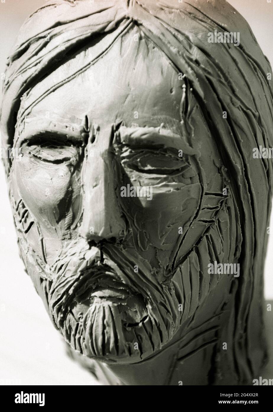 Photograph of Jesus Christ face clay sculpture Stock Photo - Alamy