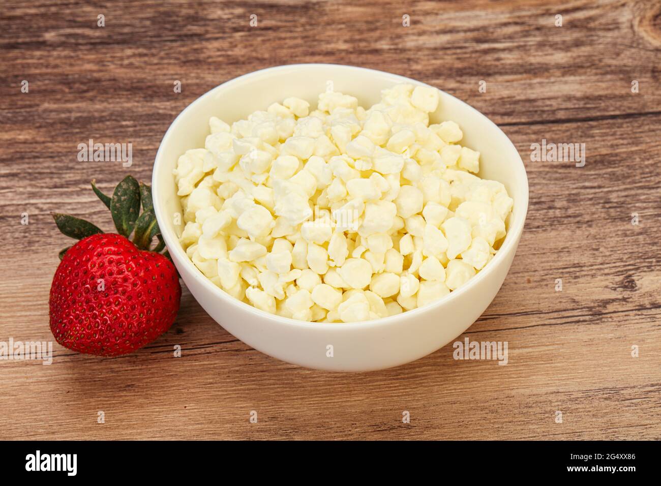 Dietary food - grain cottage cheese in the bowl Stock Photo - Alamy