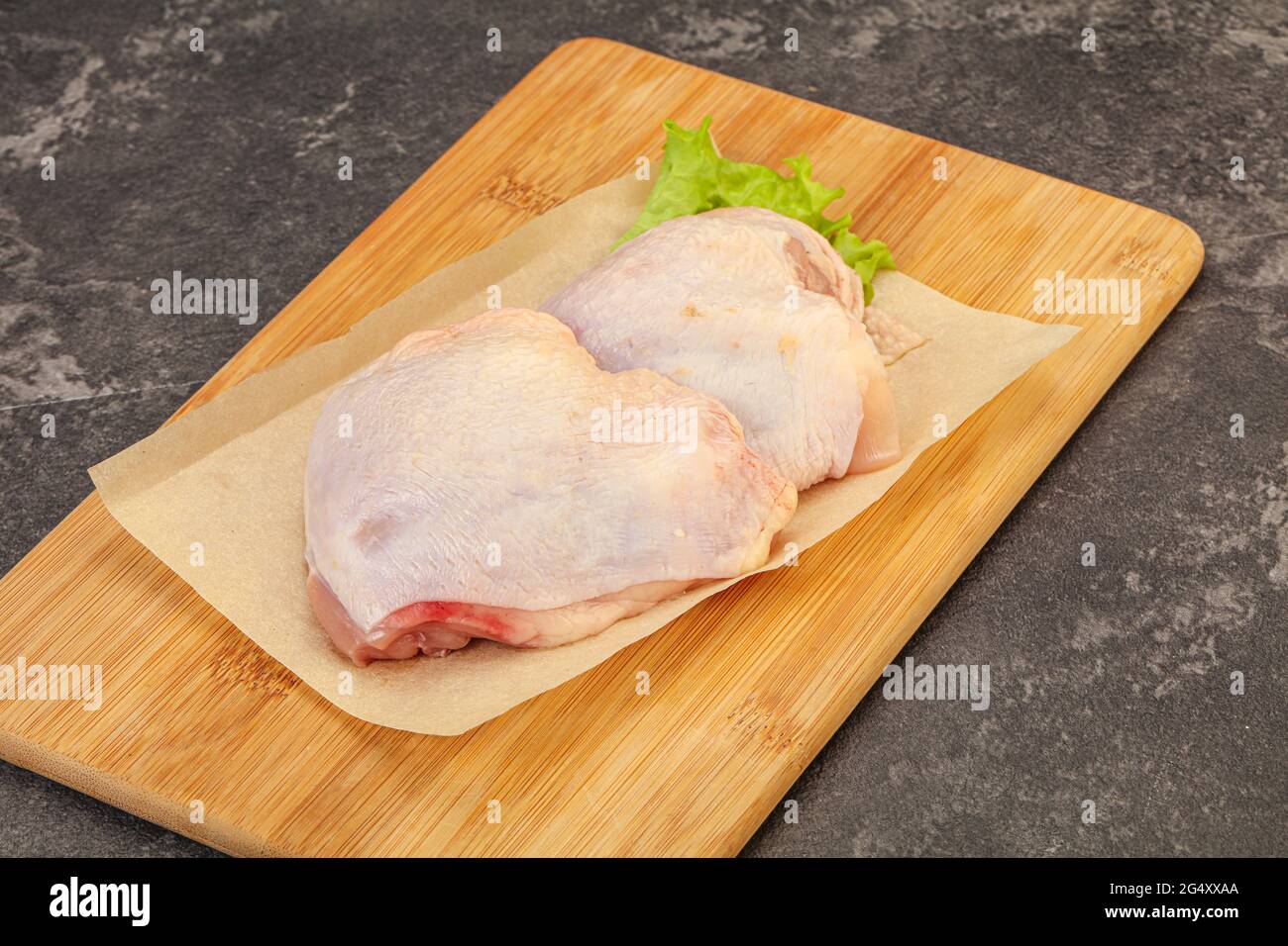 Raw chicken hip ready for cooking Stock Photo - Alamy