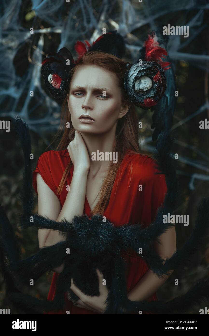 The young model is posing as a fairy in a spiderweb Stock Photo - Alamy