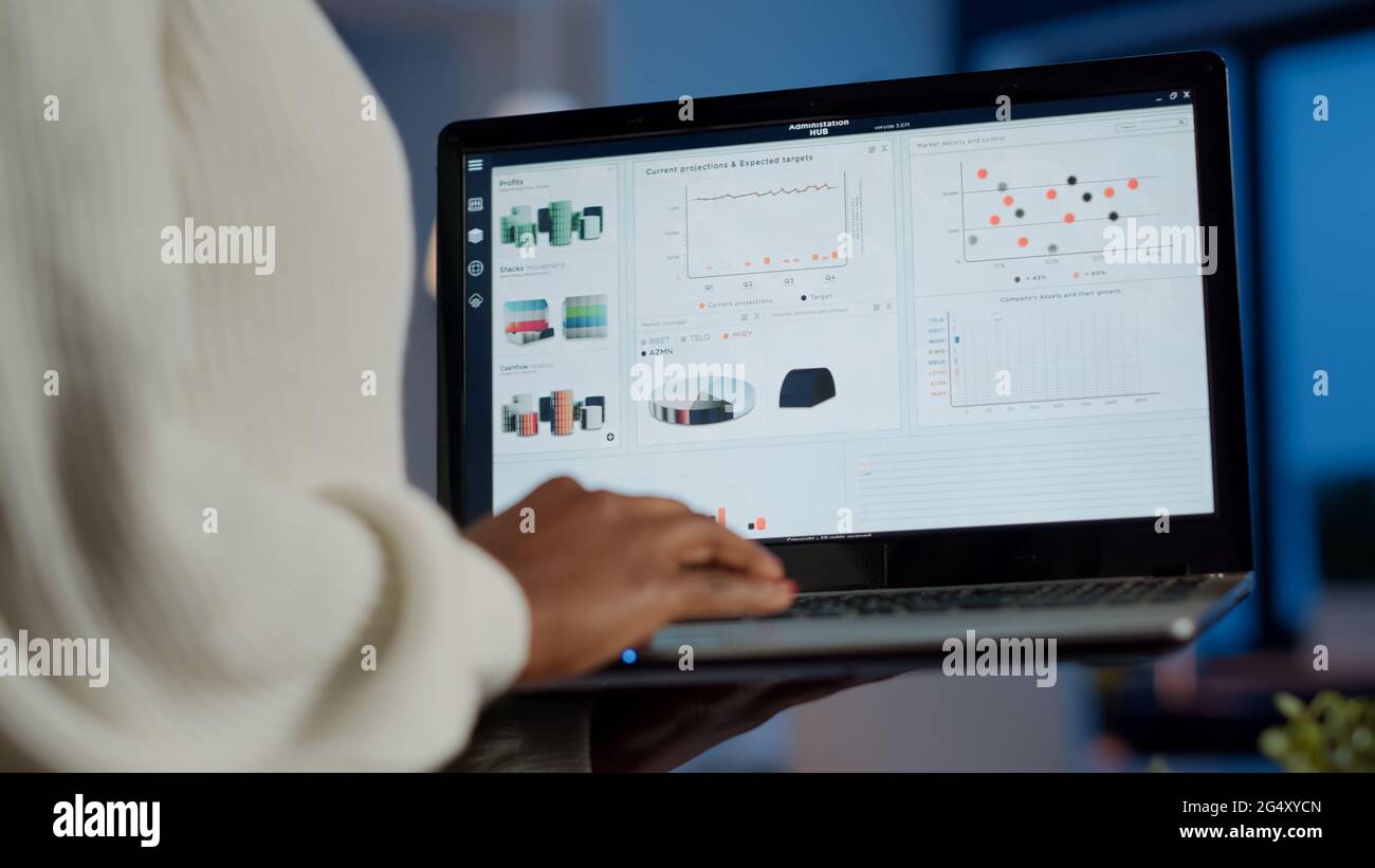 Workaholic focused businesswoman analysing hi-res stock photography and ...