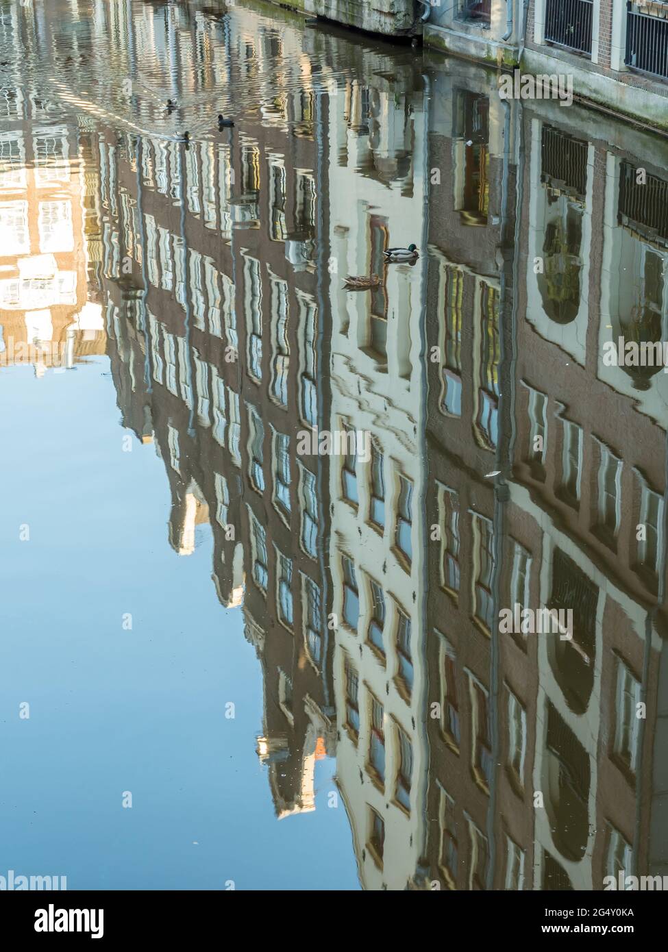 AMSTERDAM - OCTOBER 2: Peaceful warm morning scene along canal in ...