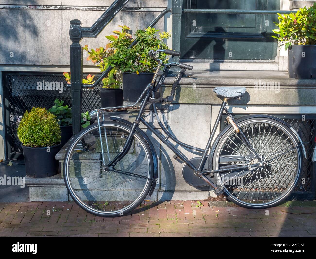 AMSTERDAM - OCTOBER 2: Peaceful warm morning scene along canal in ...