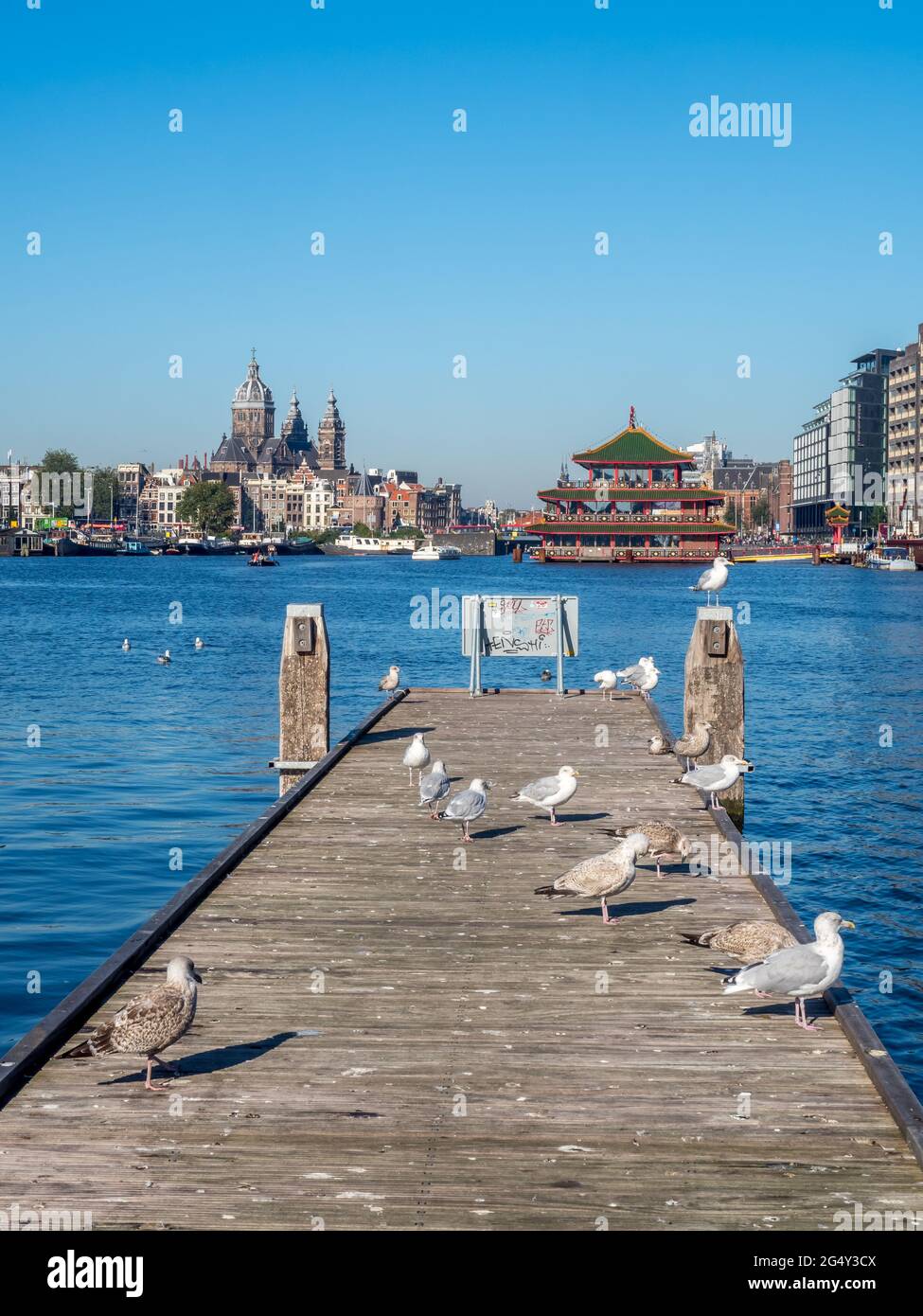AMSTERDAM - OCTOBER 2: Saint Nicholas church with surrounding buildings ...