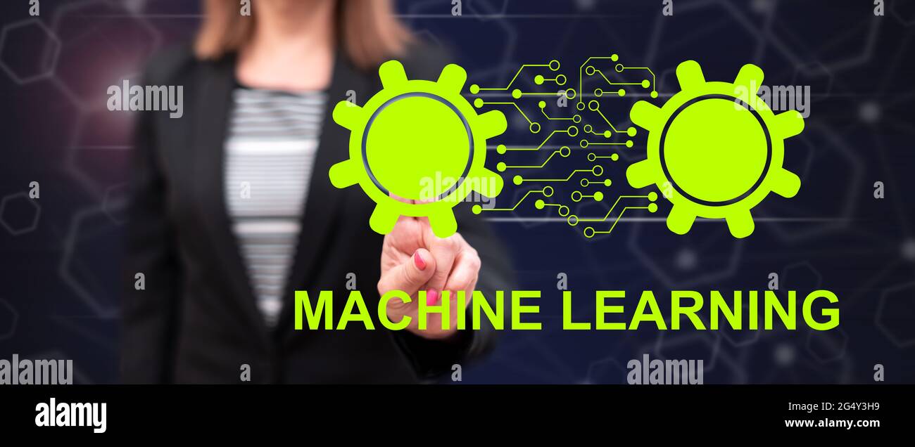 Woman touching a machine learning concept on a touch screen with her ...
