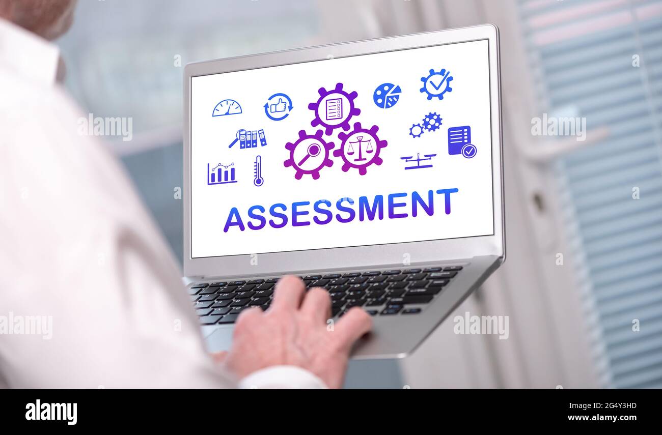 Assessment concept shown on a laptop used by a man Stock Photo - Alamy