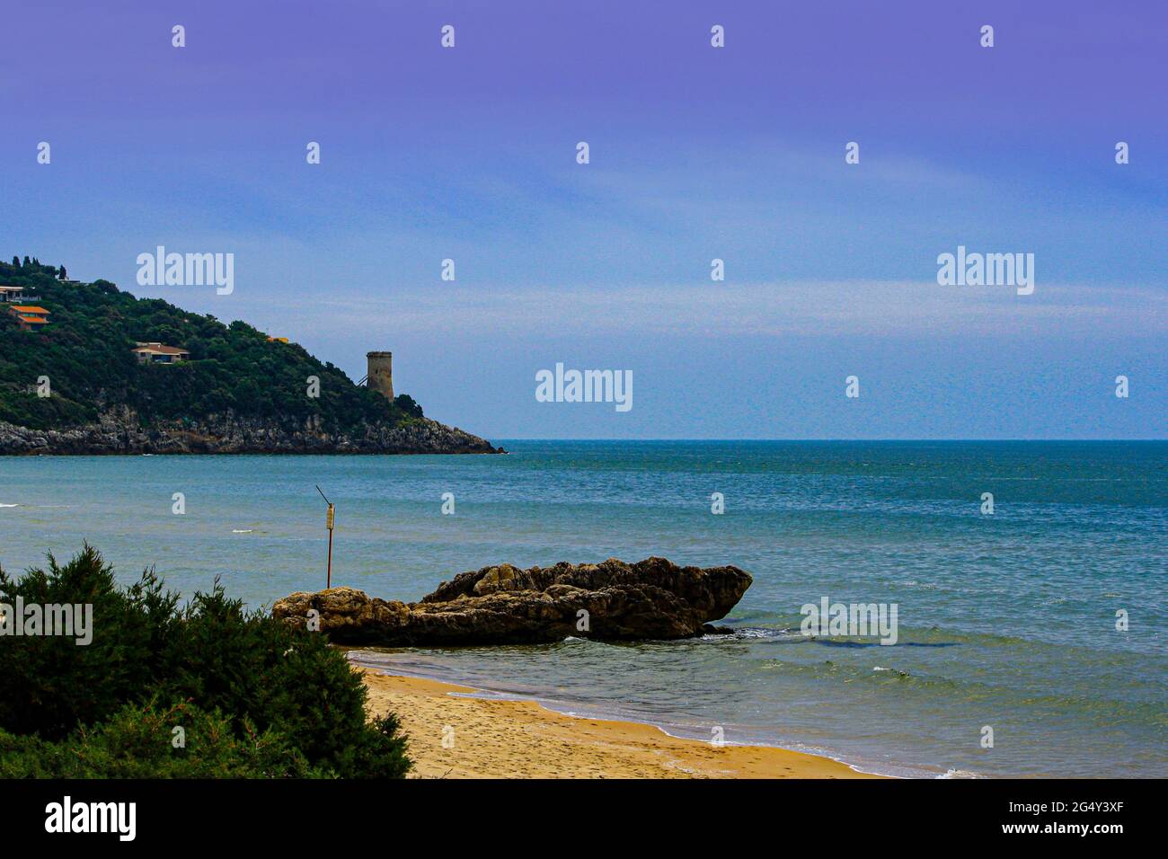 Sperlonga beach with an ancient tower on the bottom Stock Photo - Alamy