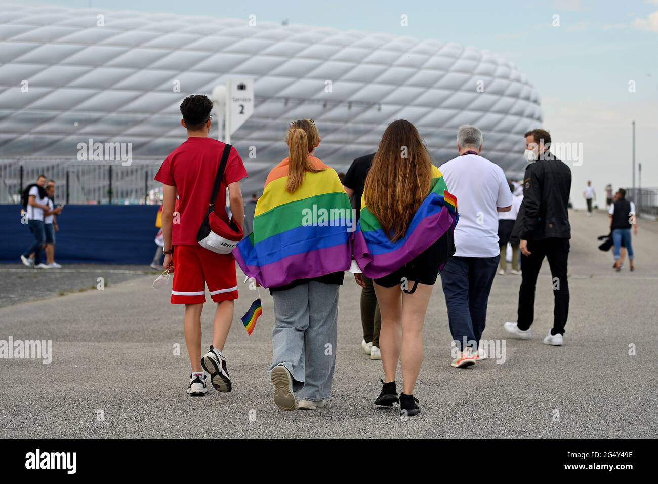 Feature, fans on the way to the stadium with LGBTQ */LGBT flags ...