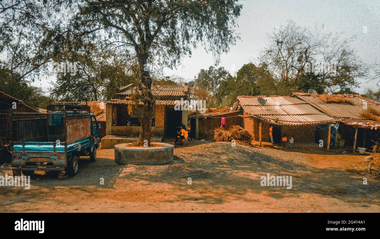 home is made up of soil , village photo and auto stand , two home , and ...