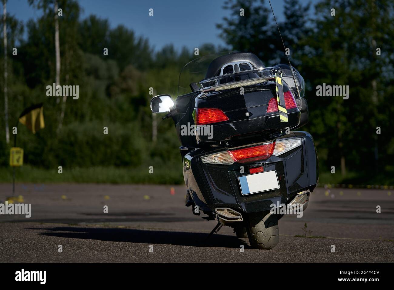 Bi tourist Motorcycle parked at a convention. View from behind Stock ...