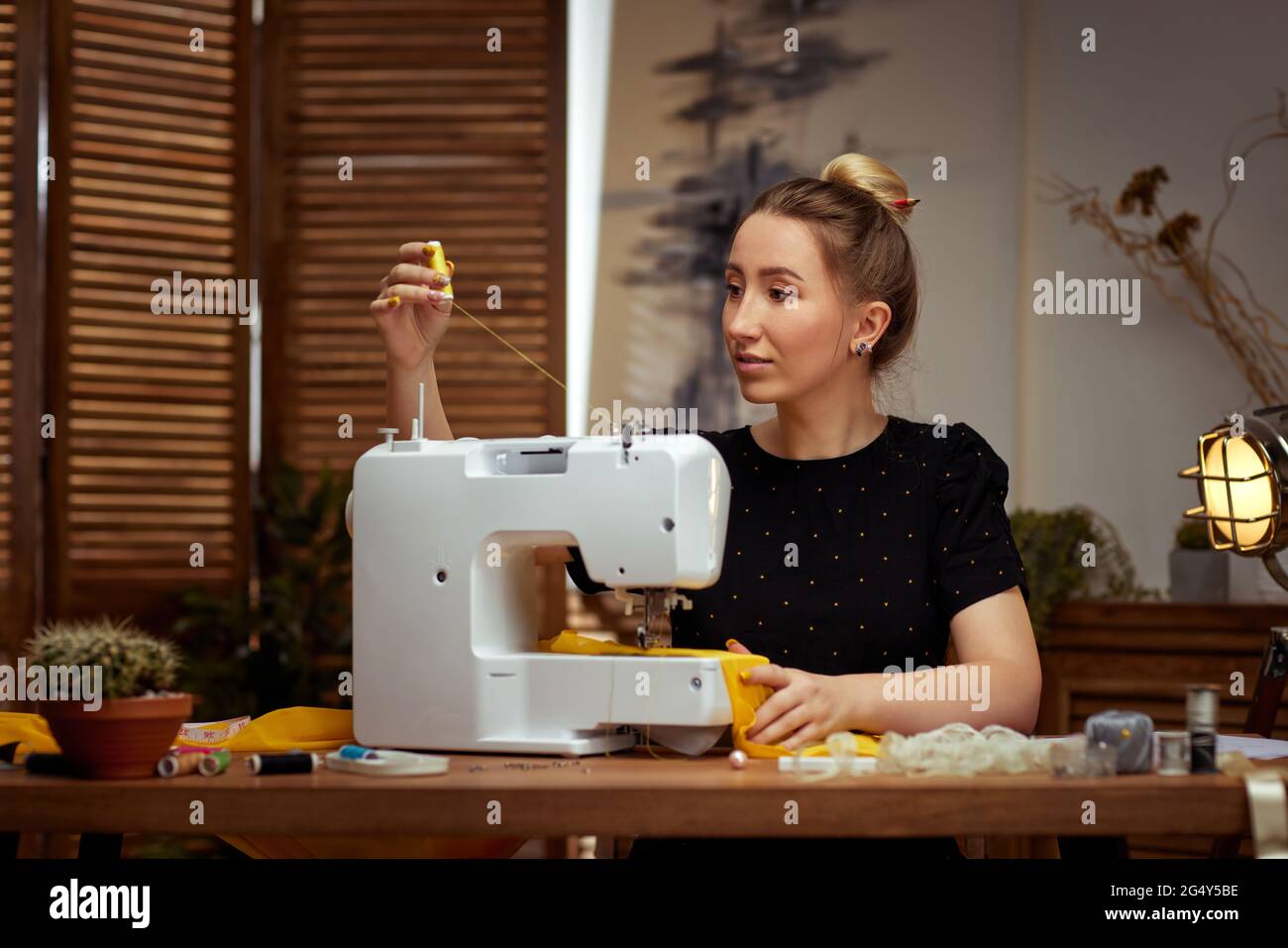 Seamstress dressmaker dressmaking machine design hi-res stock photography and images - Alamy