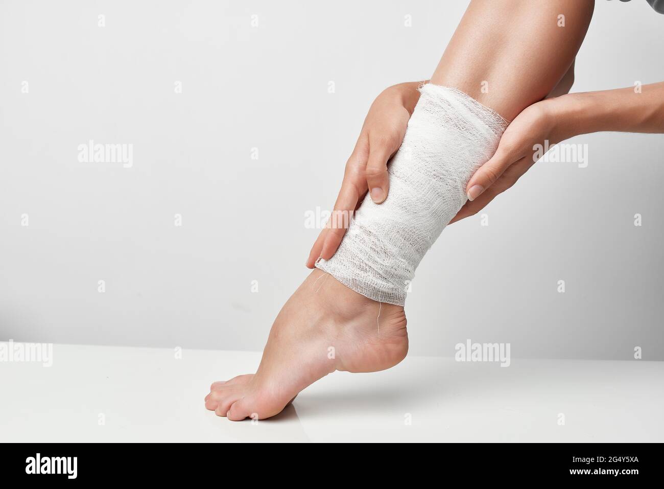 bandaged leg injury health treatment lifestyle Stock Photo - Alamy
