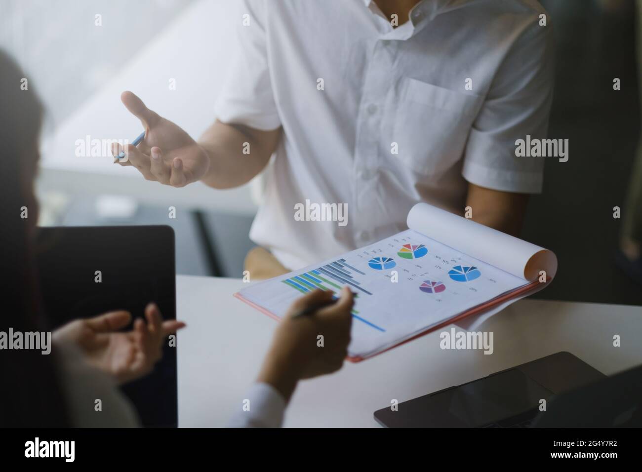 Marketing plan researching. Paperwork on the paperwork on wooden desk ...