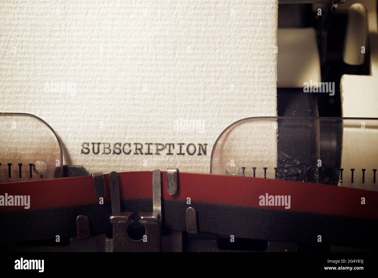 The word subscription written with a typewriter Stock Photo - Alamy