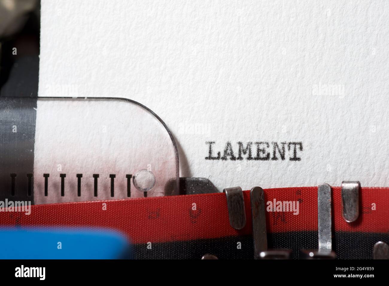 The word lament written with a typewriter Stock Photo - Alamy