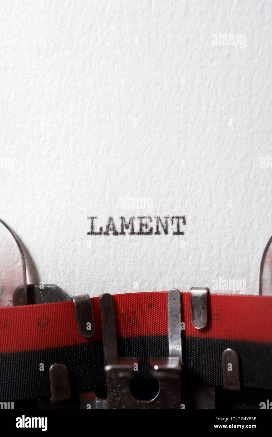 The word lament written with a typewriter Stock Photo - Alamy