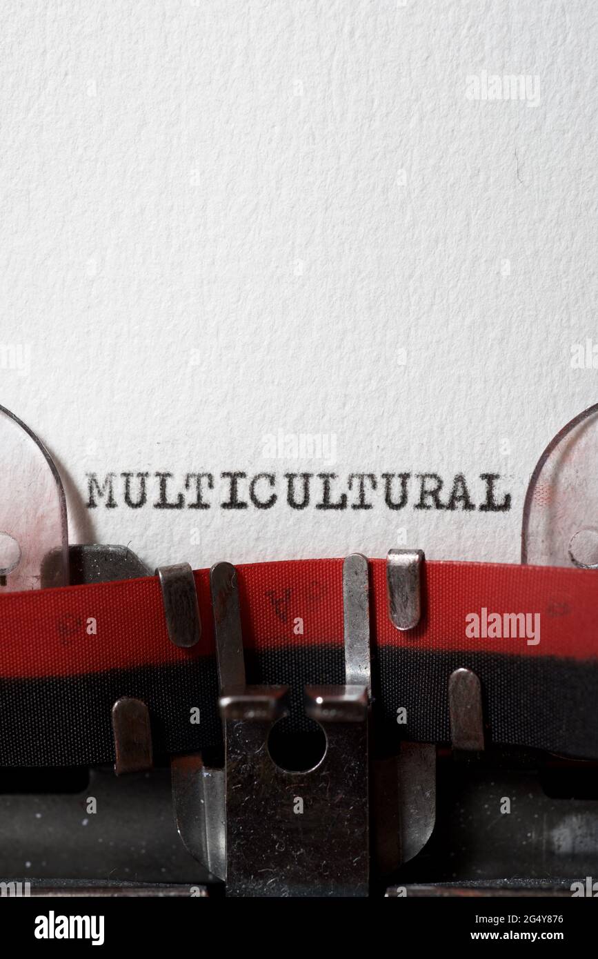 The word multicultural written with a typewriter Stock Photo - Alamy
