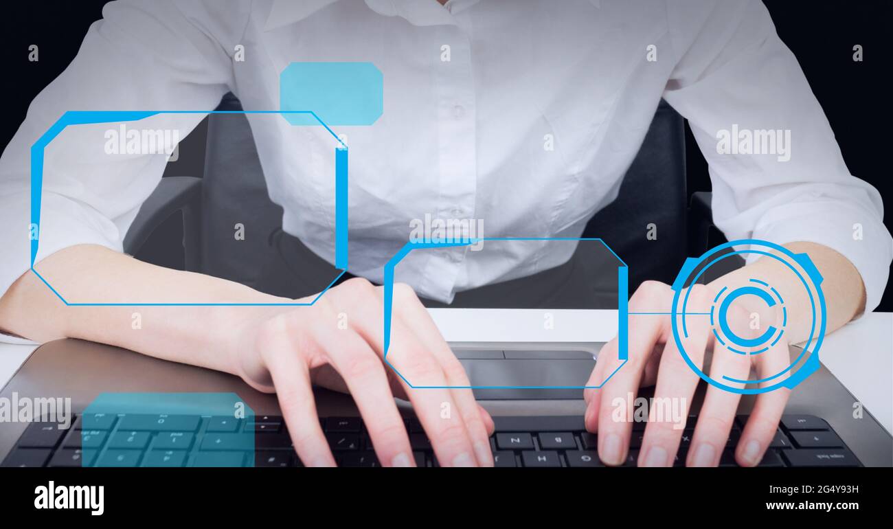 Multiple round scanners against mid section of woman using computer ... Multiple round scanners against mid section of woman using computer ...