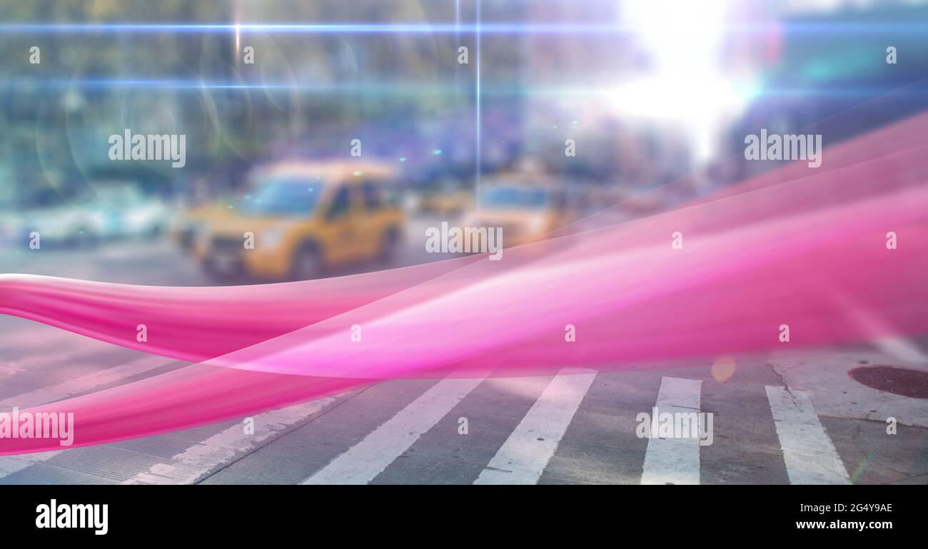 Digital composite image of pink digital wave and light spot against ...