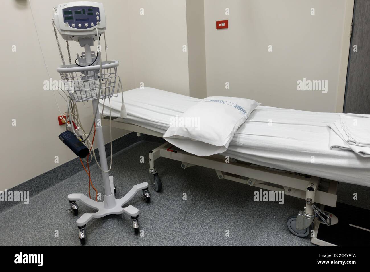 Hospital bed and blood pressure, blood oxygen and heart rate ...