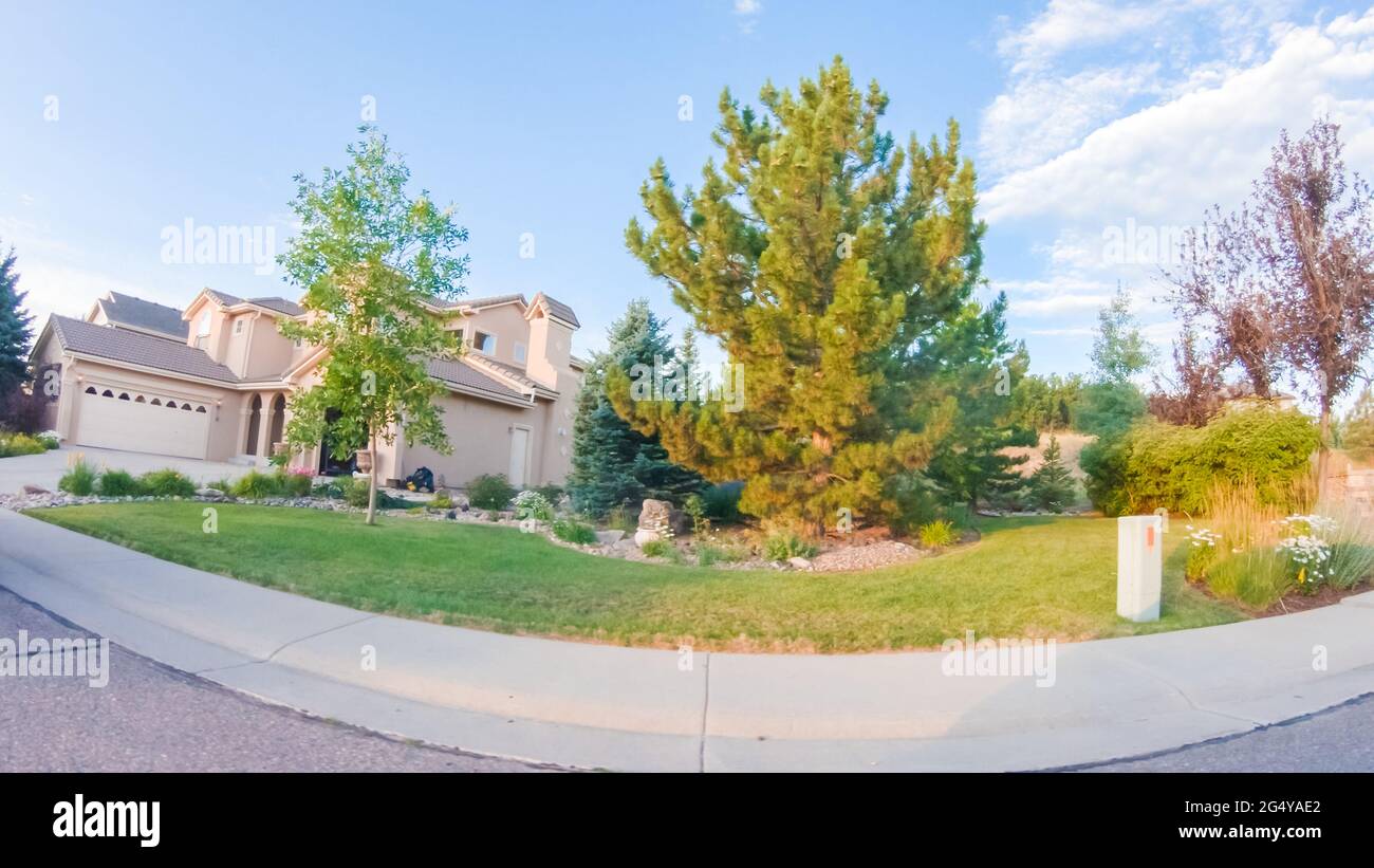 View of the typical suburban neighborhood on a summer morning Stock ...