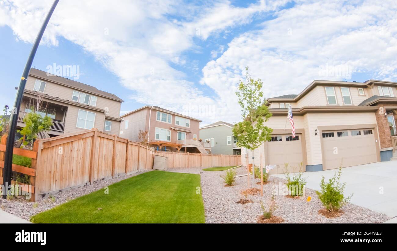 View of the typical suburban neighborhood on a summer morning Stock ...