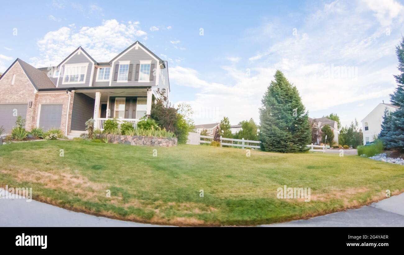 View of the typical suburban neighborhood on a summer morning Stock ...