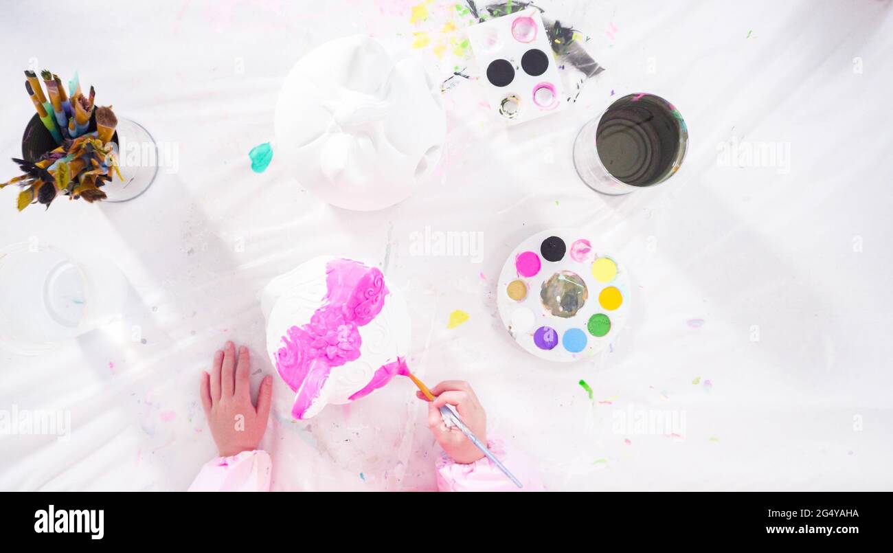 Flat lay. Painting craft pumpkin with acrylic paint for Halloween Stock ...