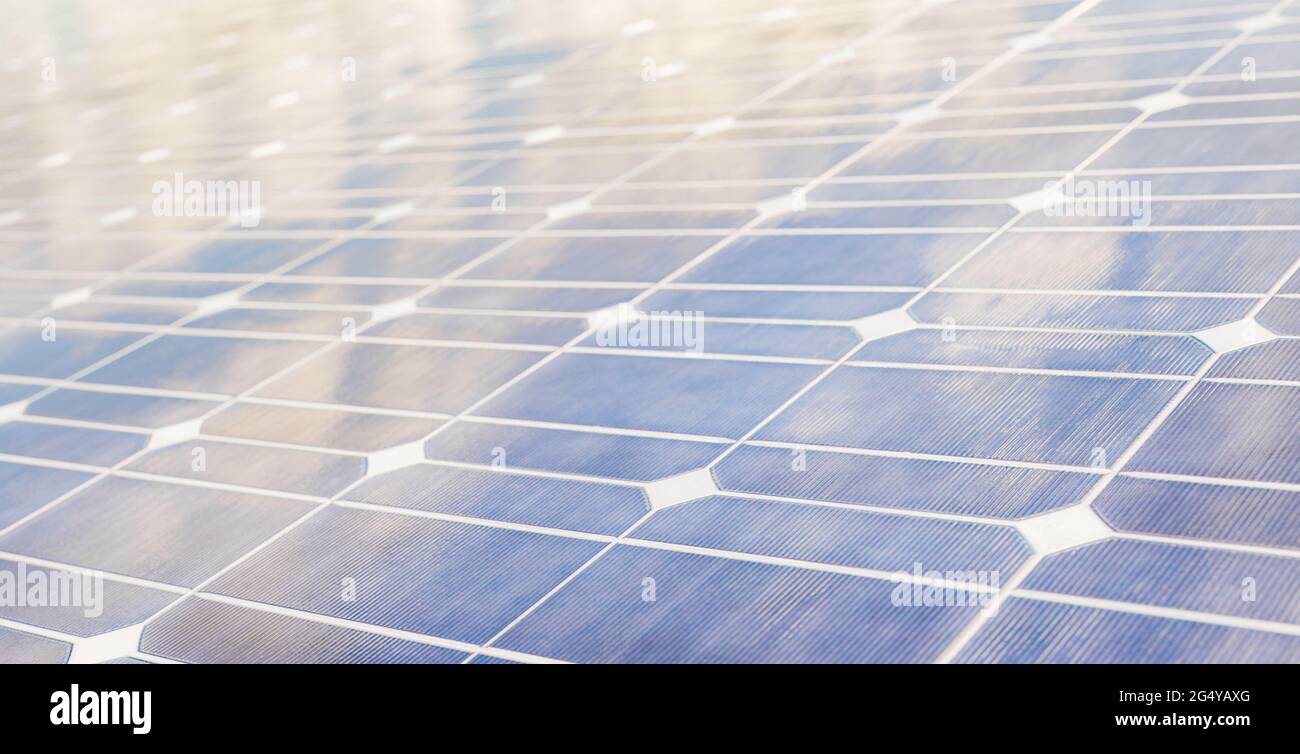 close up of photovoltaic panel background with reflected clouds ...