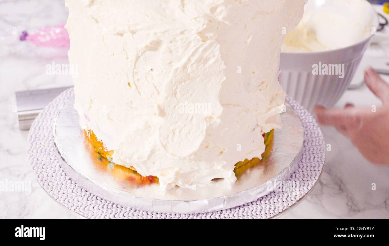 Step by step. Frosting round funfetti cake with white italian ...