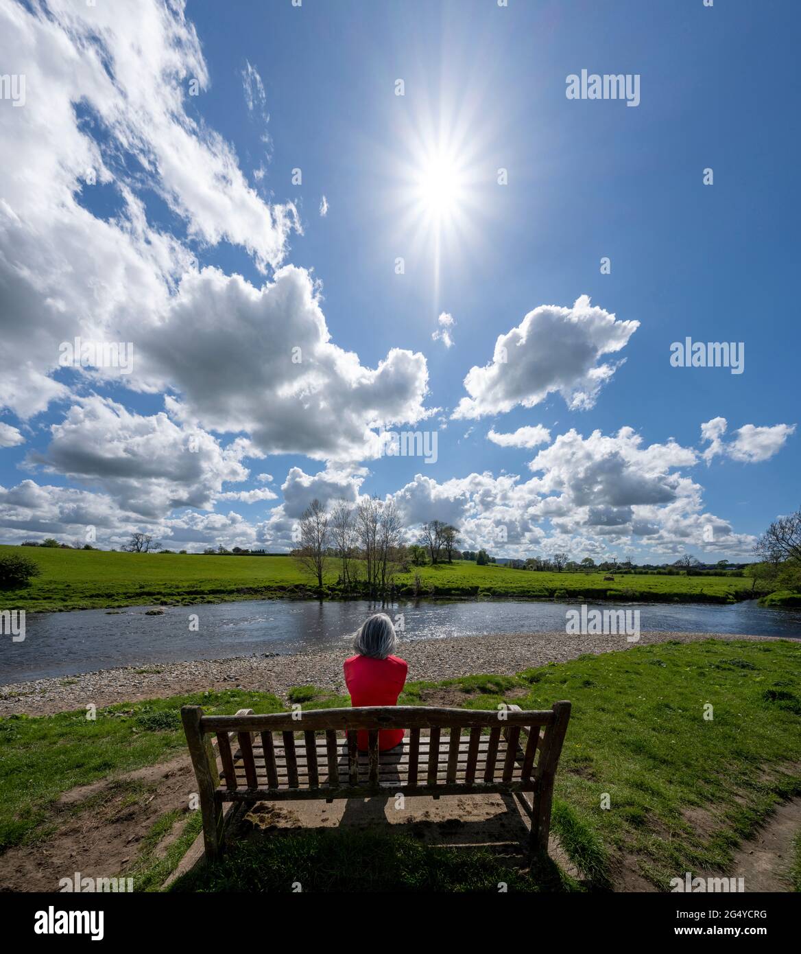 Female sat on bench hi-res stock photography and images - Alamy