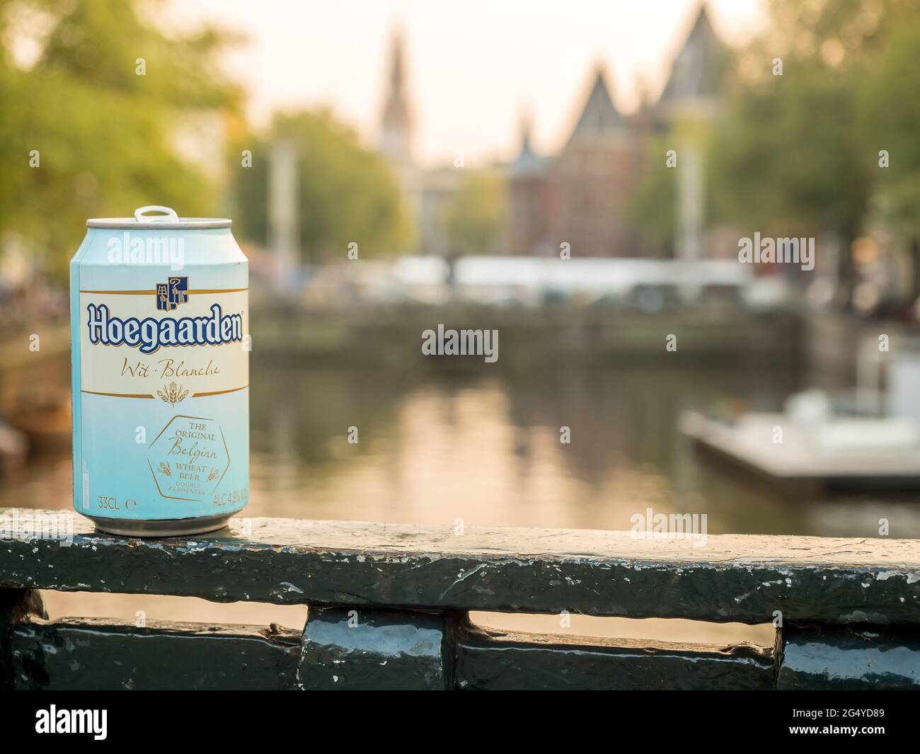 AMSTERDAM - OCTOBER 4: Hoegaarden beer can with blurring city scene ...