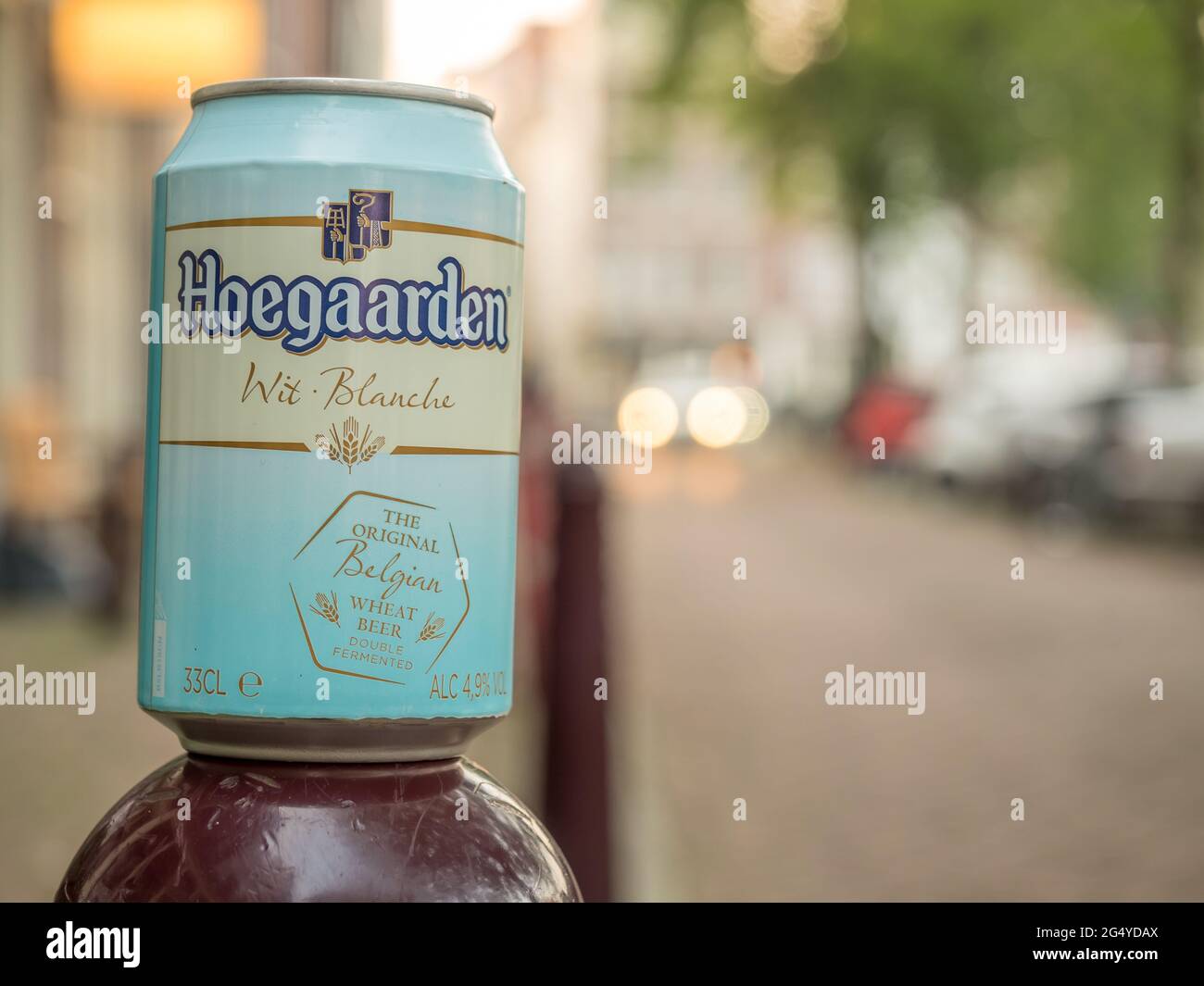 AMSTERDAM - OCTOBER 4: Hoegaarden beer can with blurring city scene ...