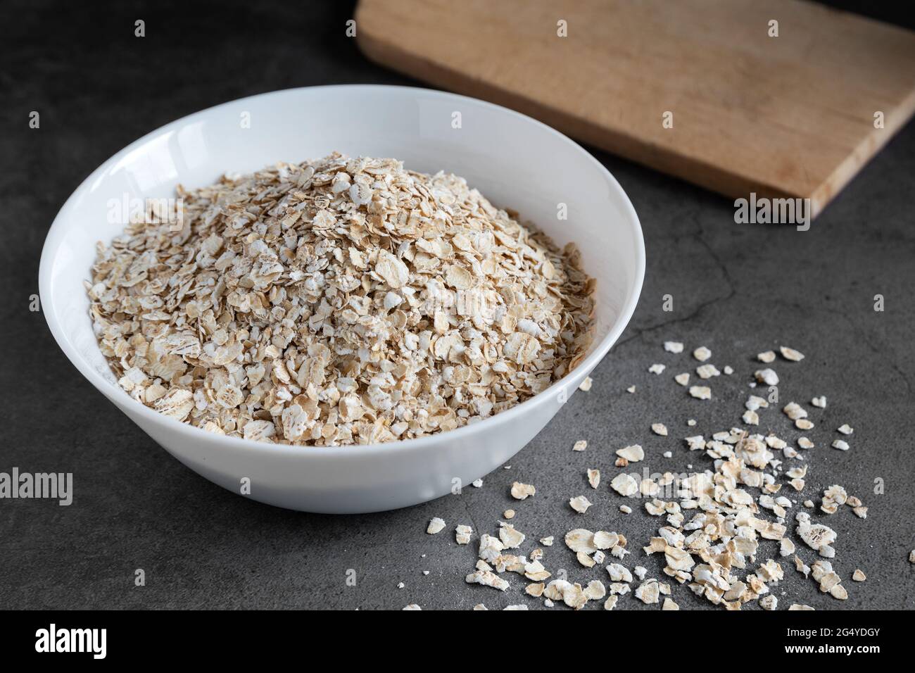 Oat flakes in a bowl Stock Photo - Alamy