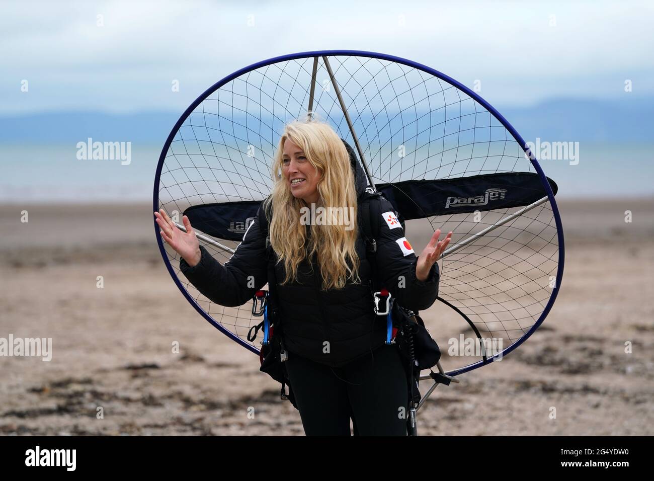 Paramotorist Sacha Dench with her adapted electric paramotor as she ...