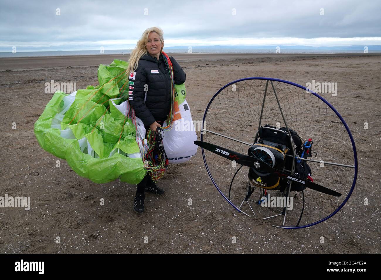 Paramotorist Sacha Dench with her adapted electric paramotor as she ...