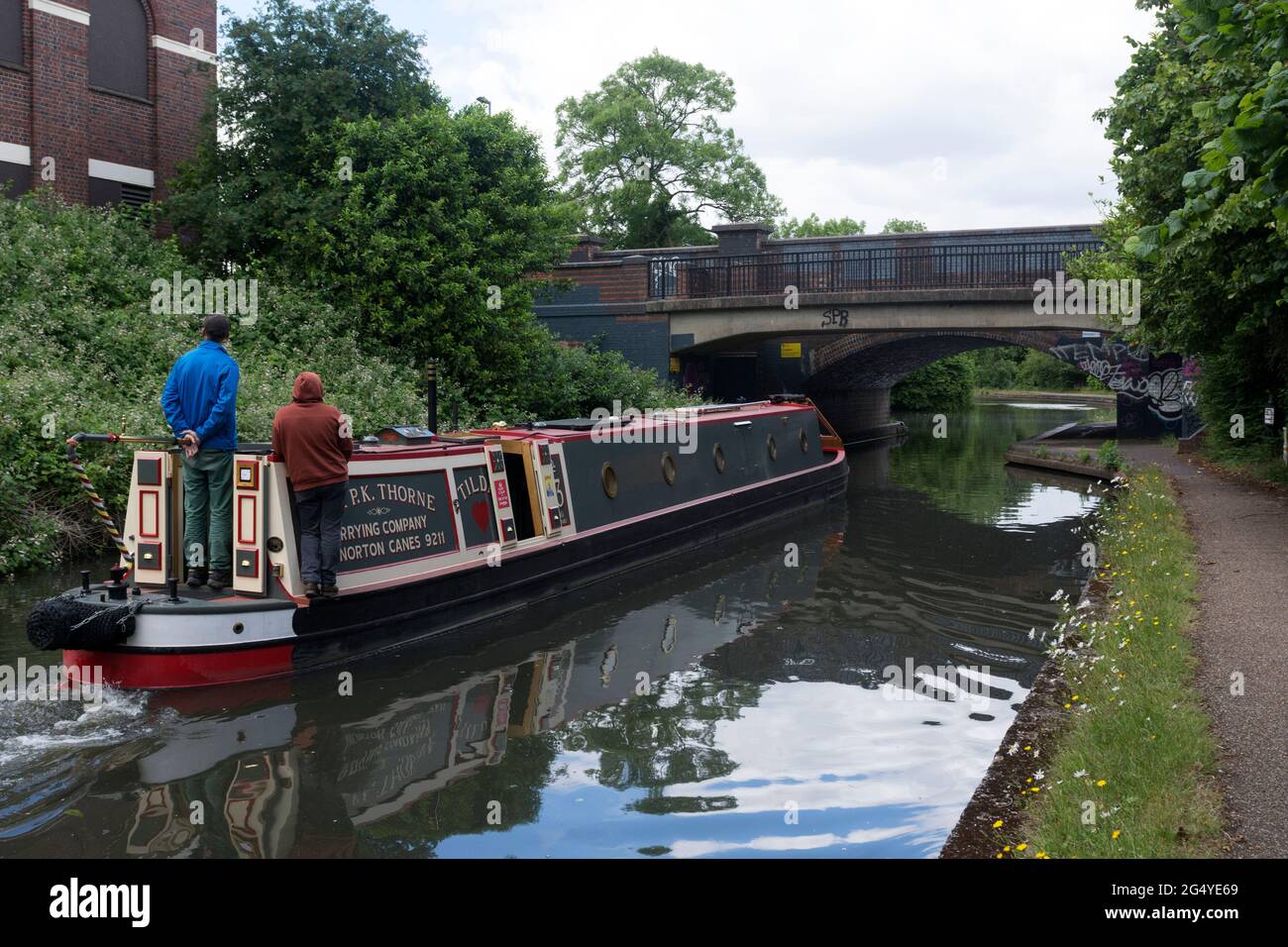 A narrowboat on the Grand Union Canal at Kings Road bridge, Tyseley ...