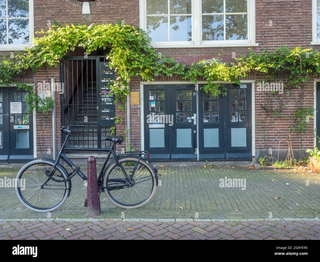 AMSTERDAM - OCTOBER 3: City scene of Amsterdam along canal in autumn ...