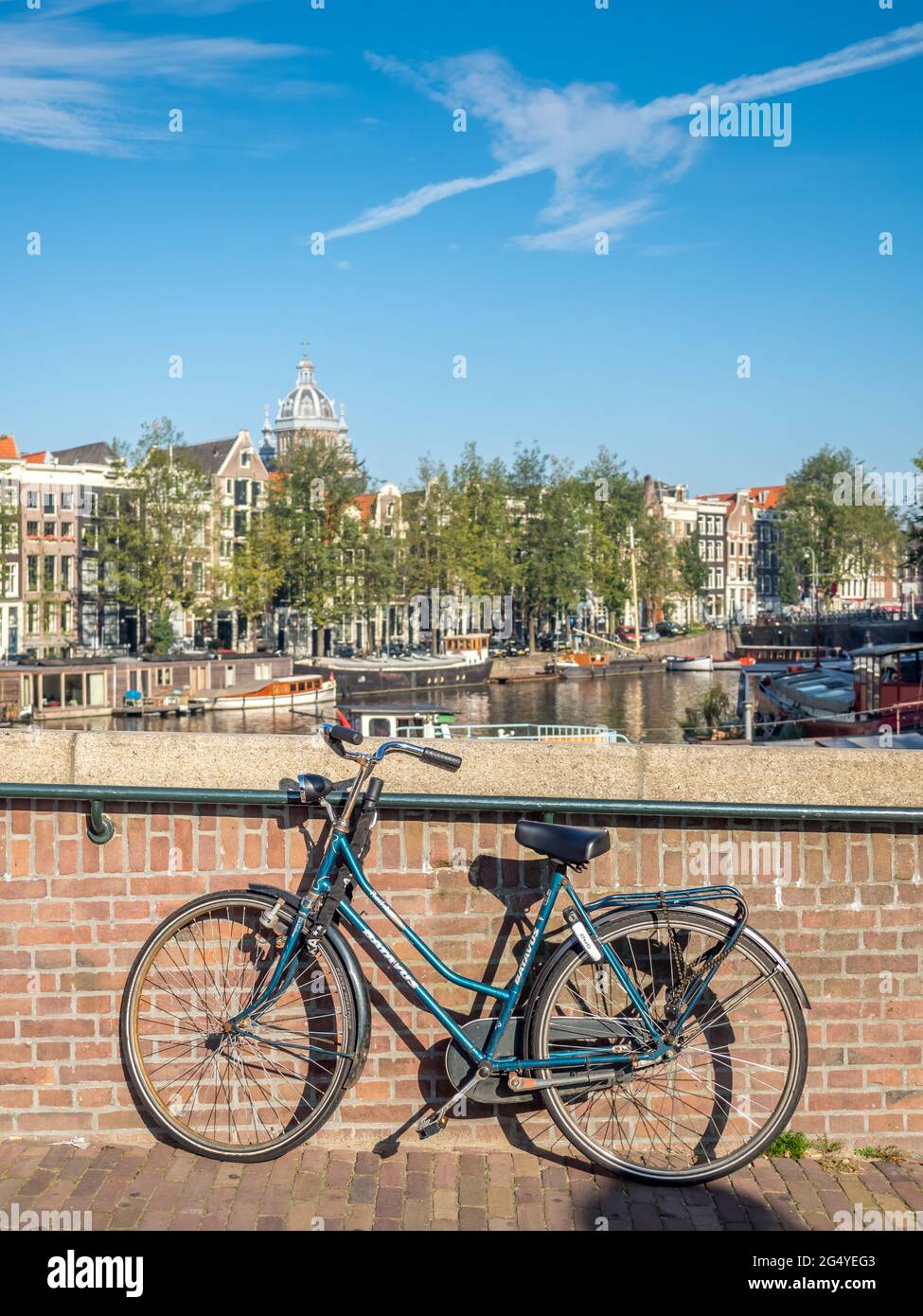 AMSTERDAM - OCTOBER 3: City scene of Amsterdam along canal in autumn ...