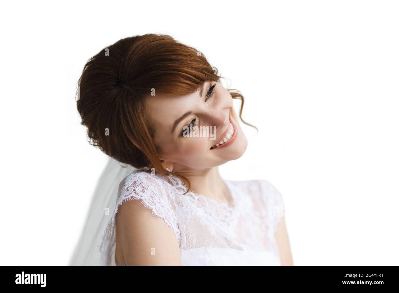 close-up portrait of the bride with a happy toothy smiling face ...