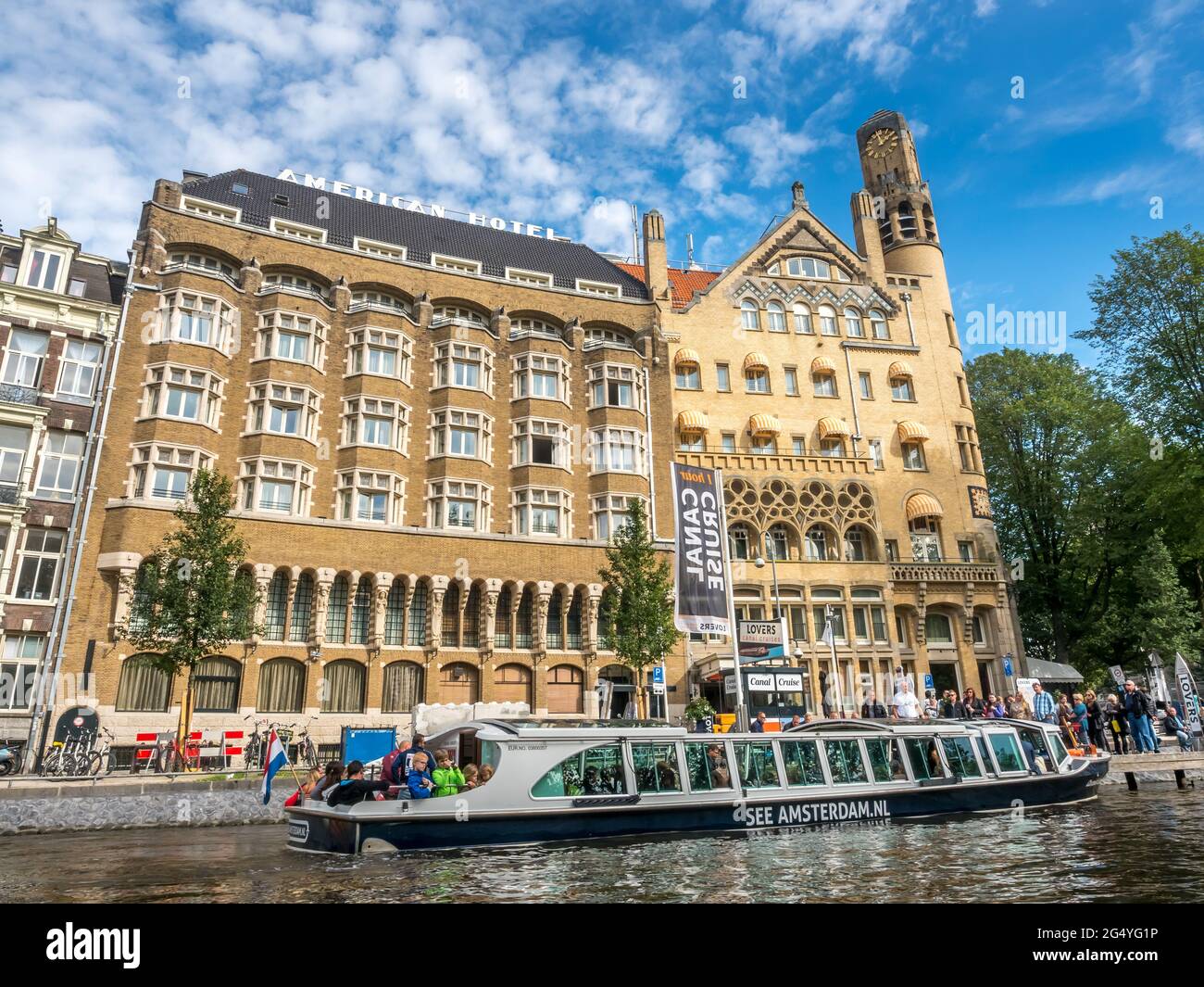 AMSTERDAM - OCTOBER 3: City scene along canal during cruising on boat ...