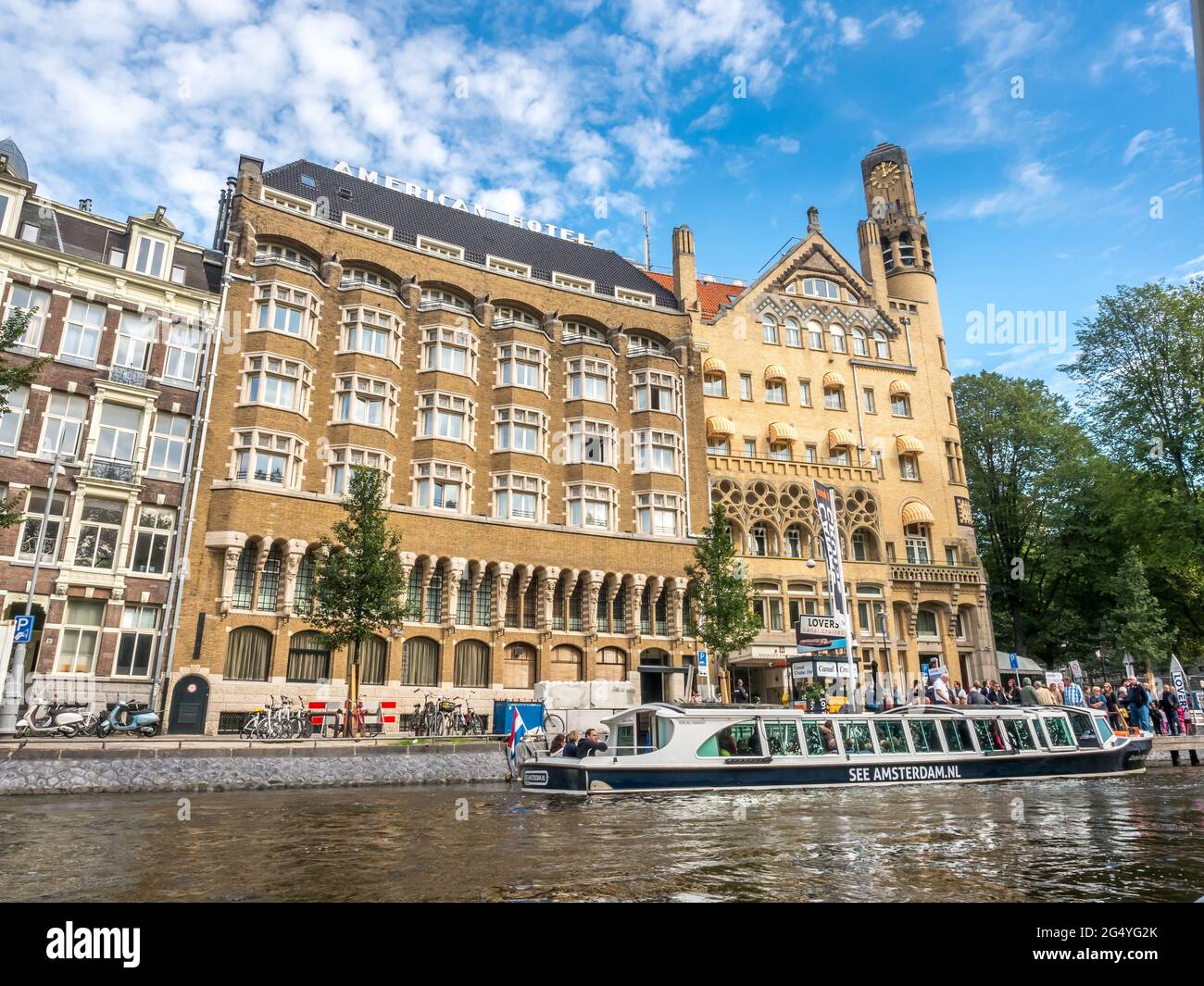 AMSTERDAM - OCTOBER 3: City scene along canal during cruising on boat ...