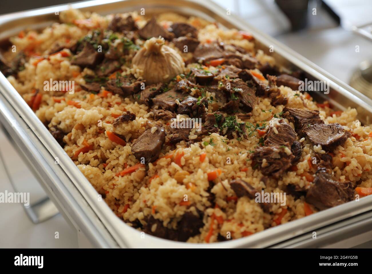 Closeup shot of delicious rice with meat at a buffet Stock Photo - Alamy