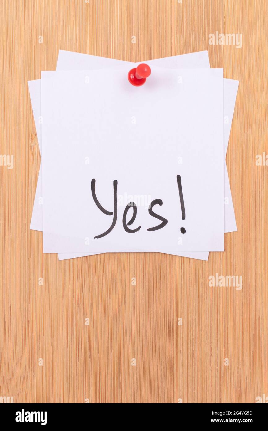 YES! - White Sticky Notes with Written Word YES, Pinned to the Wooden ...