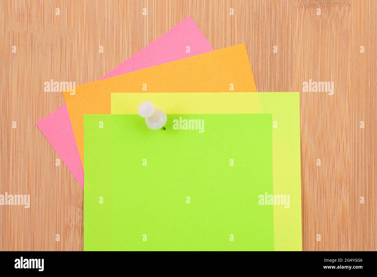 Colored Sticky Notes with Copyspace Pinned to the Wooden Message Board ...