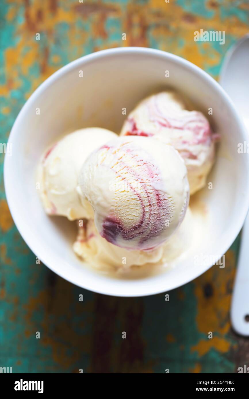 Mango and raspberry ice creams Stock Photo - Alamy