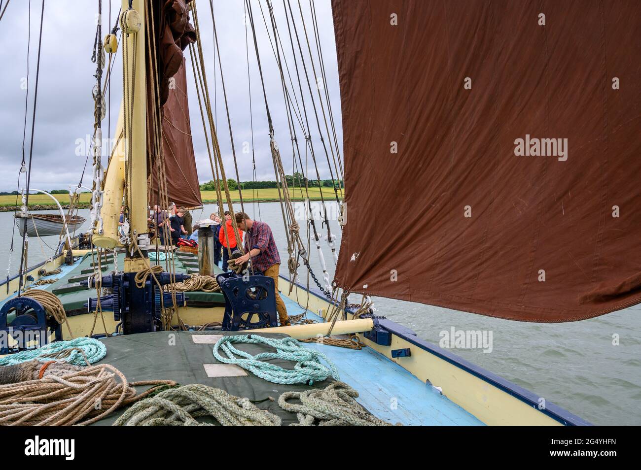 Crew and guests on "Edith May", a historic sailing barge, on a charter ...